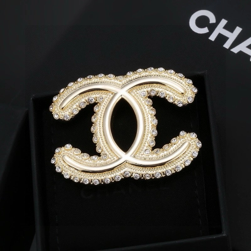 Indistinguishable Chanel Brooches