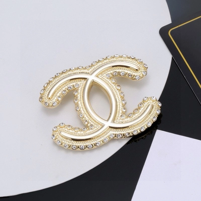 Indistinguishable Chanel Brooches