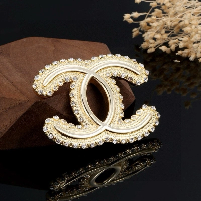 Indistinguishable Chanel Brooches