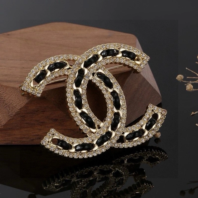 Reasonably priced Chanel Brooches