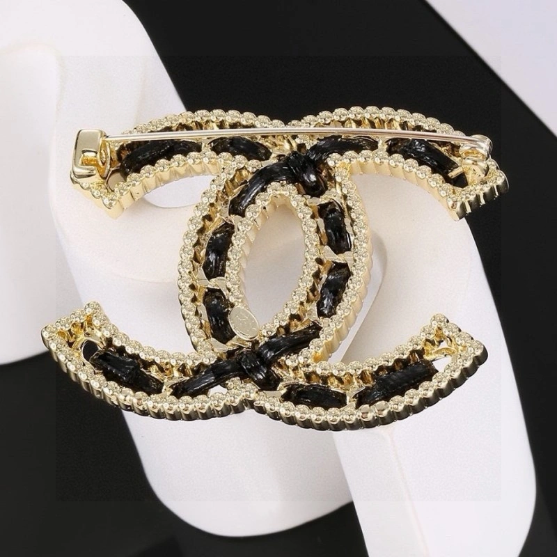 Reasonably priced Chanel Brooches