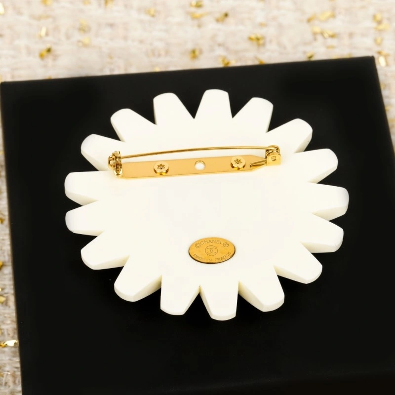 Indistinguishable Chanel Brooches