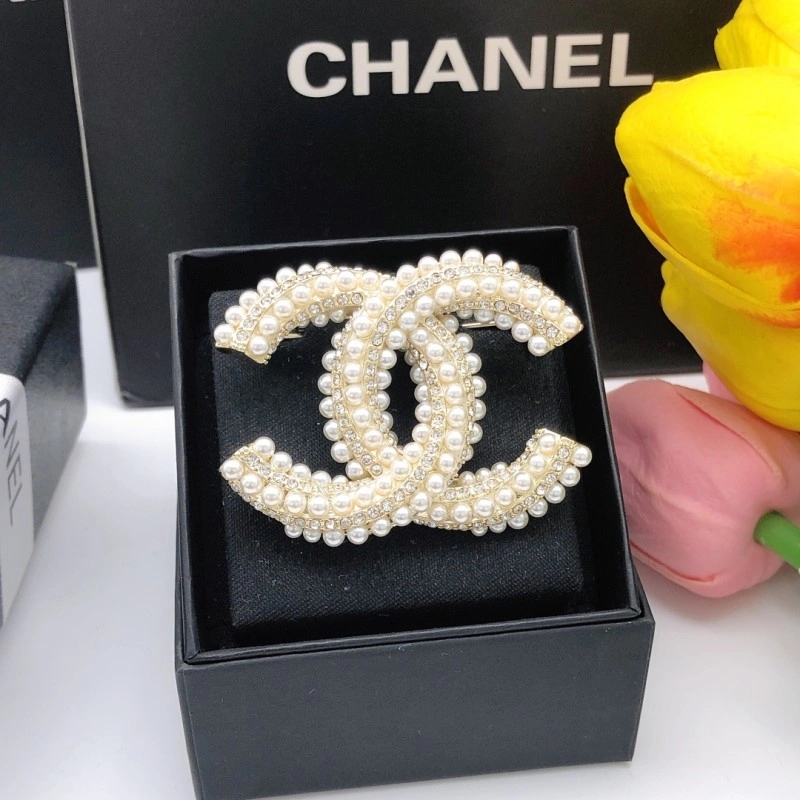 Indistinguishable Chanel Brooches