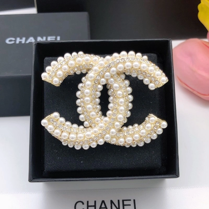 Indistinguishable Chanel Brooches