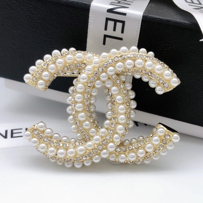 Indistinguishable Chanel Brooches