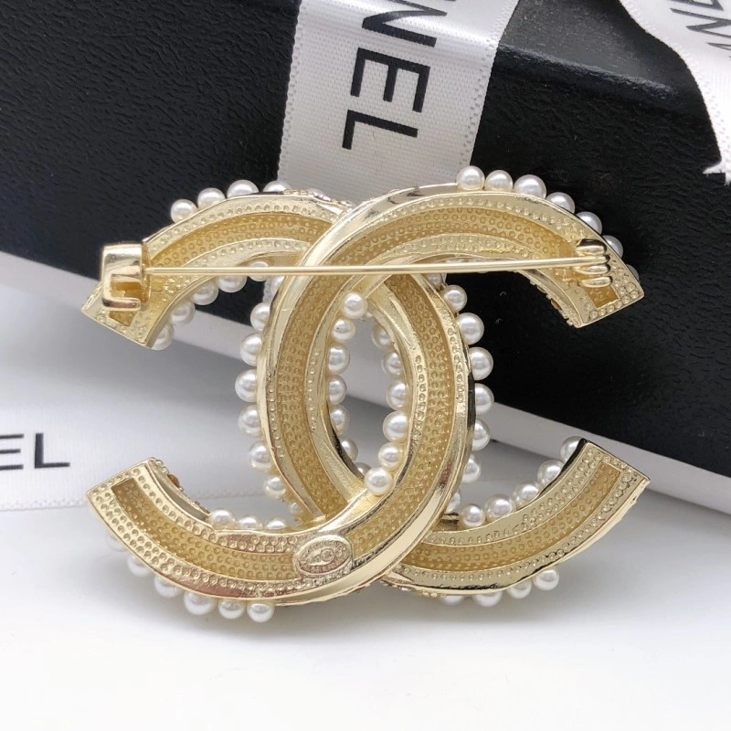 Indistinguishable Chanel Brooches