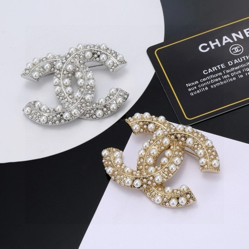 Cut-rate Chanel Brooches