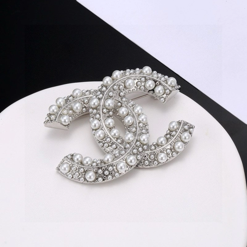 Cut-rate Chanel Brooches
