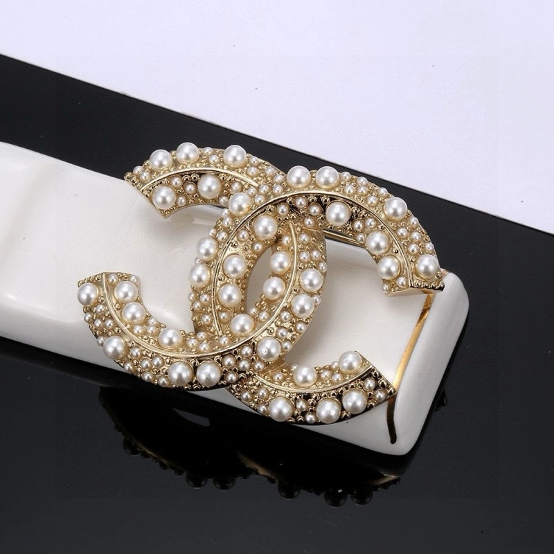 Cut-rate Chanel Brooches