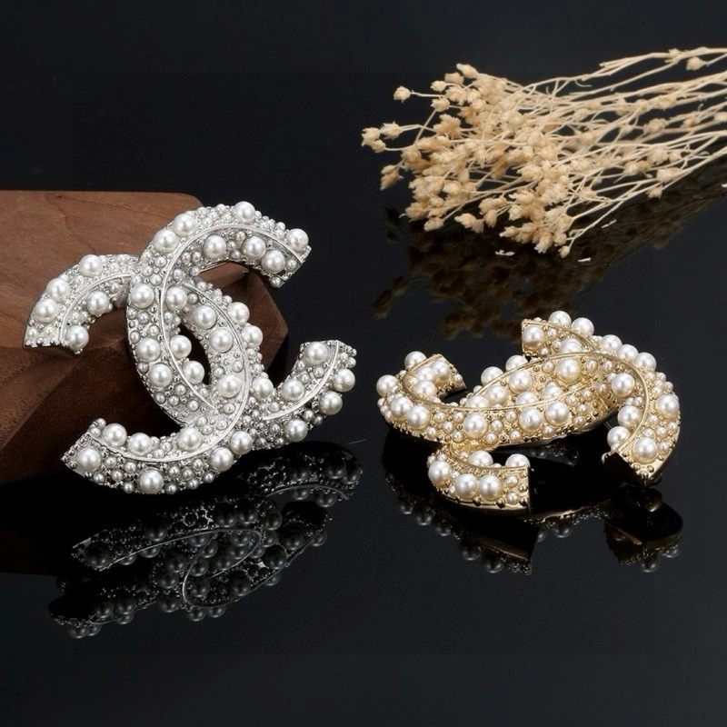 Cut-rate Chanel Brooches