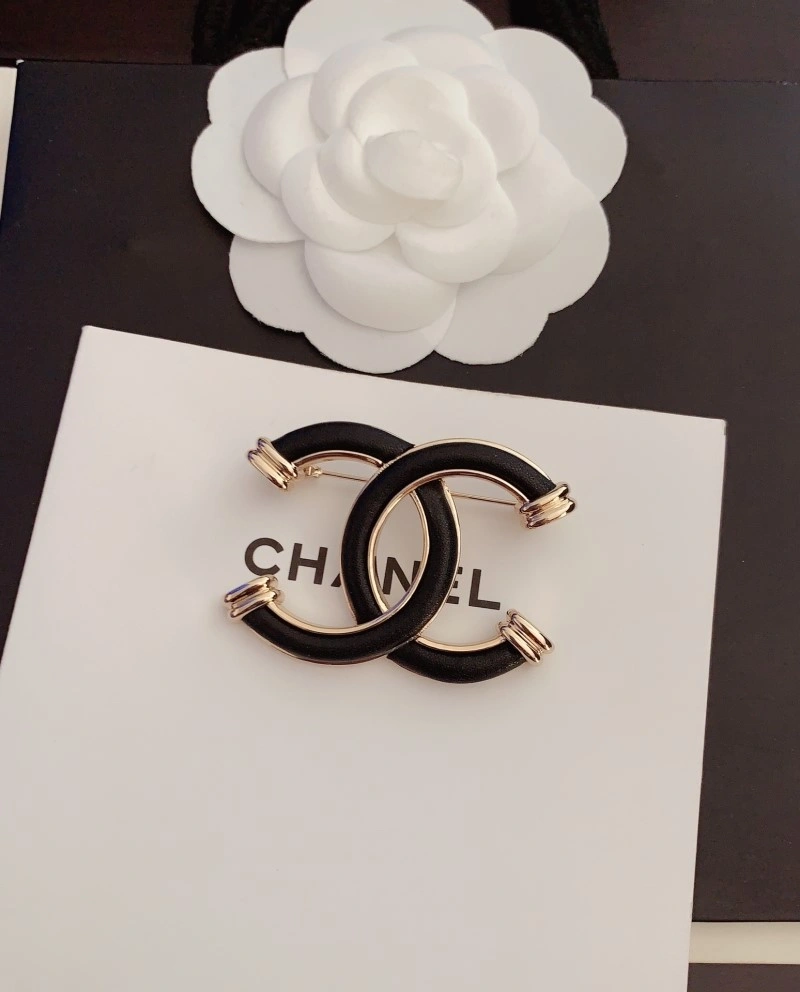 Cut-rate Chanel Brooches