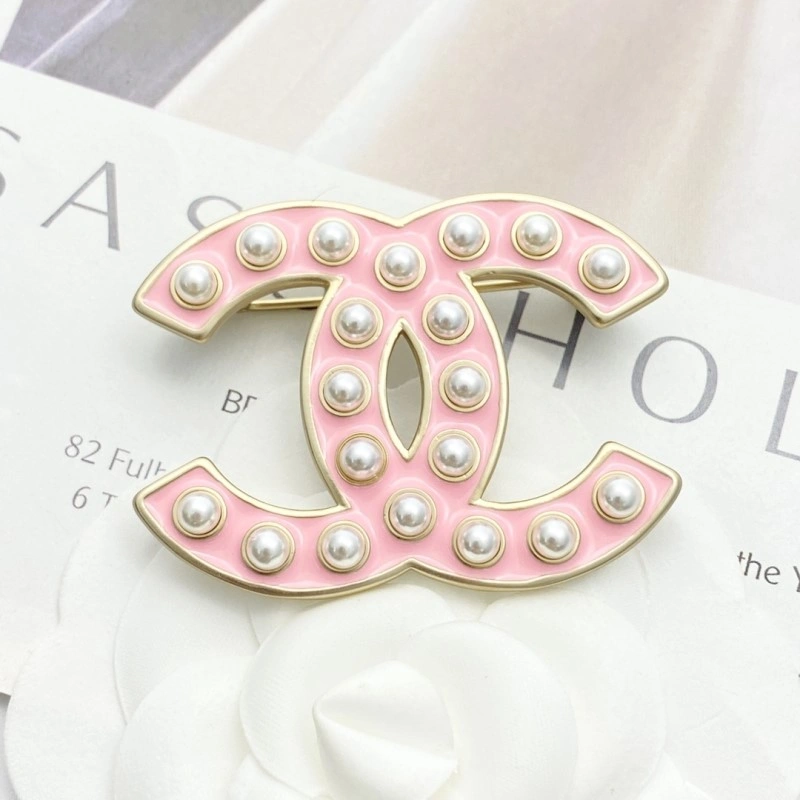 Top mirror Chanel Brooches