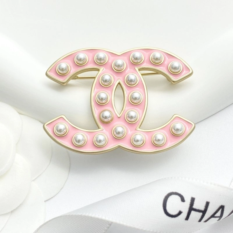 Top mirror Chanel Brooches