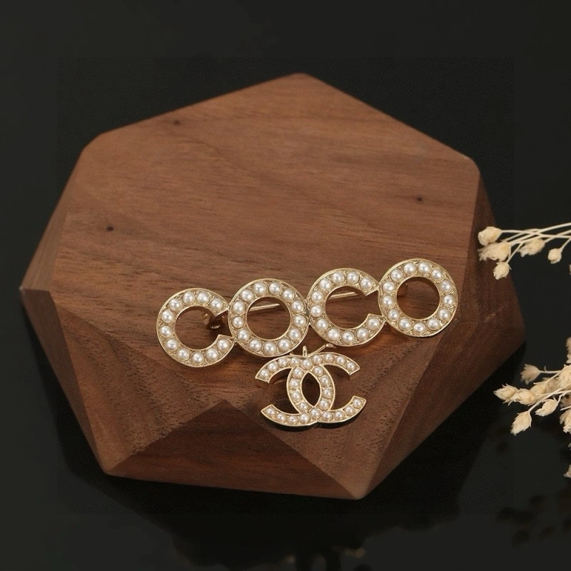 Indistinguishable Chanel Brooches