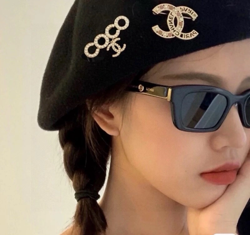 Indistinguishable Chanel Brooches