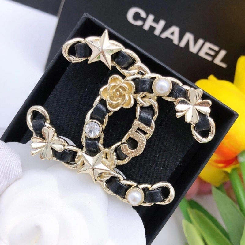 Indistinguishable Chanel Brooches
