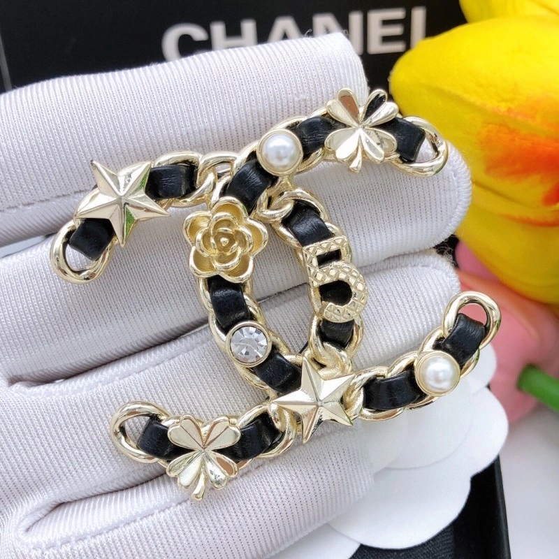 Indistinguishable Chanel Brooches