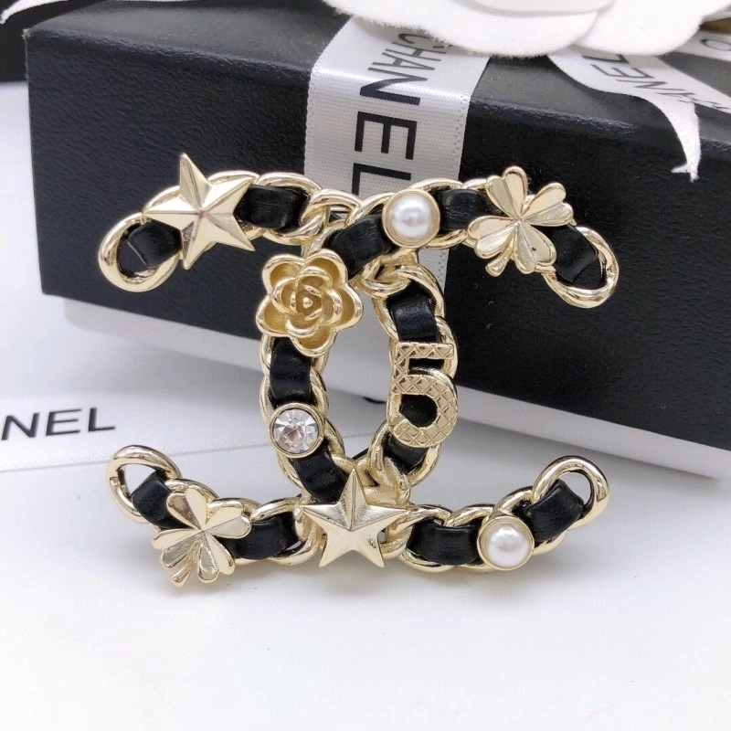 Indistinguishable Chanel Brooches