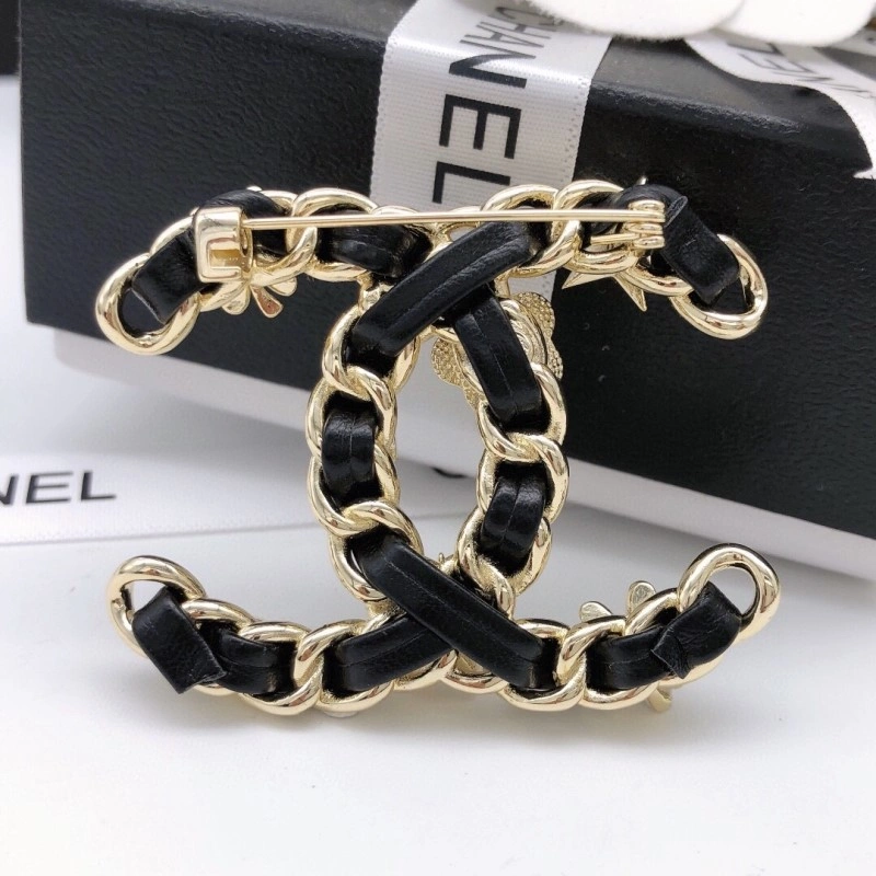 Indistinguishable Chanel Brooches