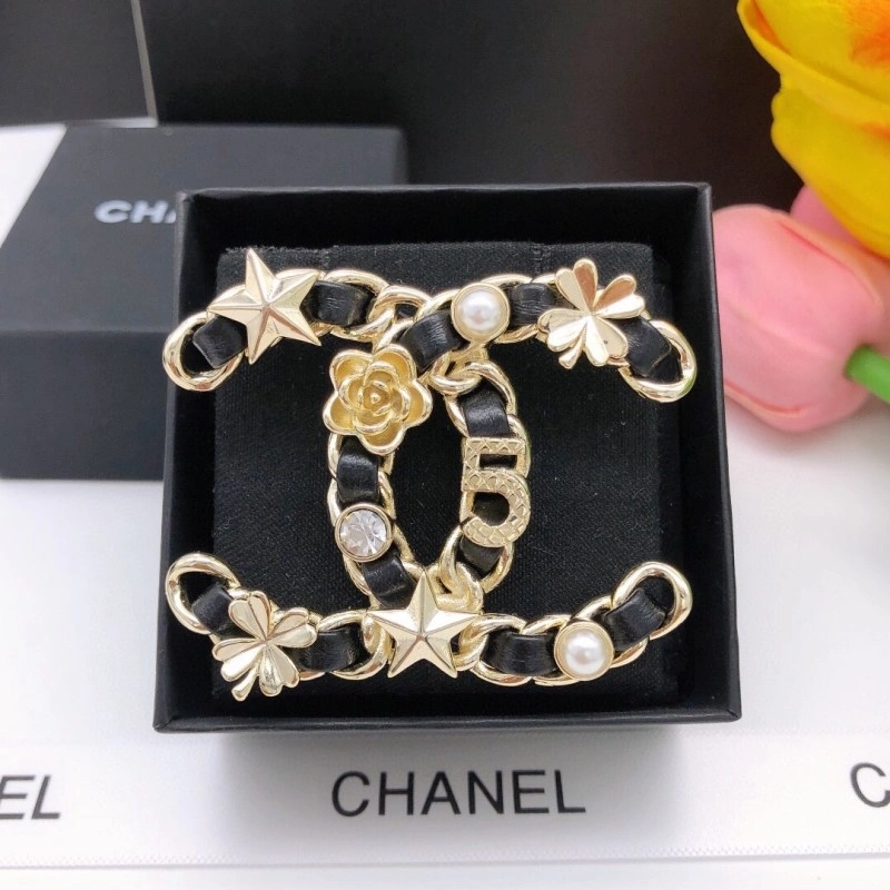 Indistinguishable Chanel Brooches