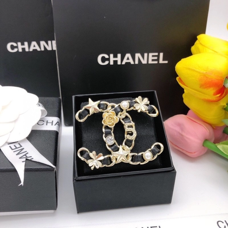 Indistinguishable Chanel Brooches