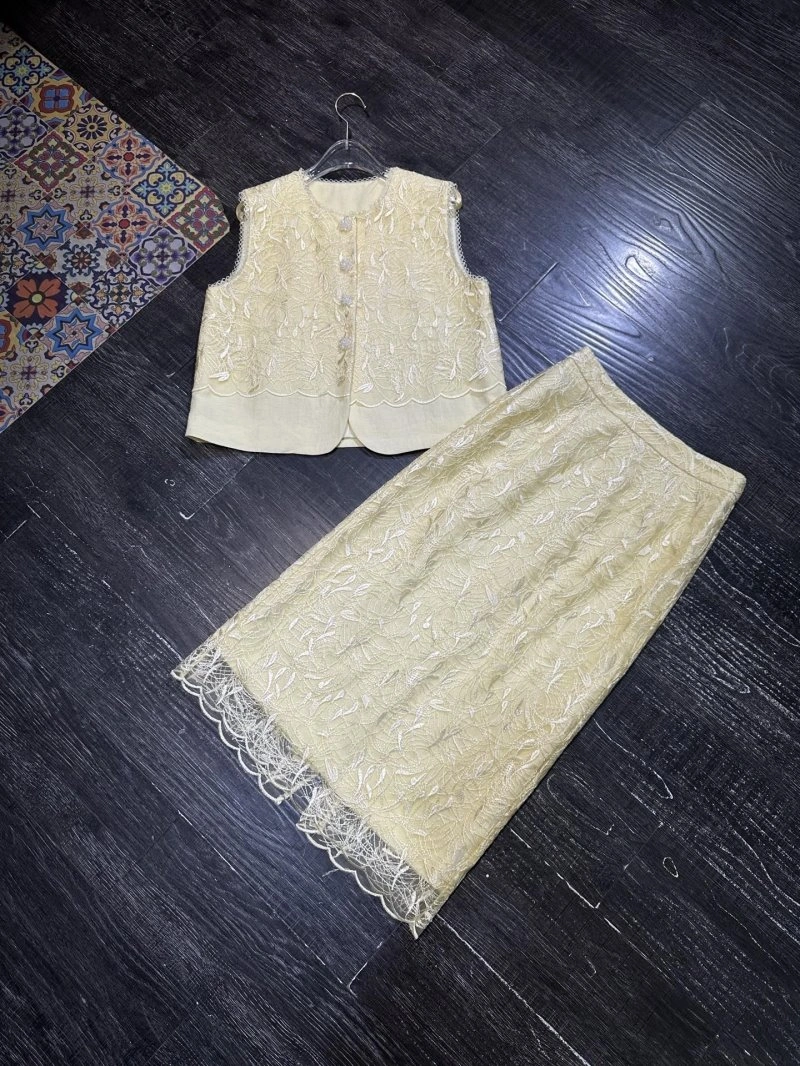 Reasonably priced Chanel Dress Suits