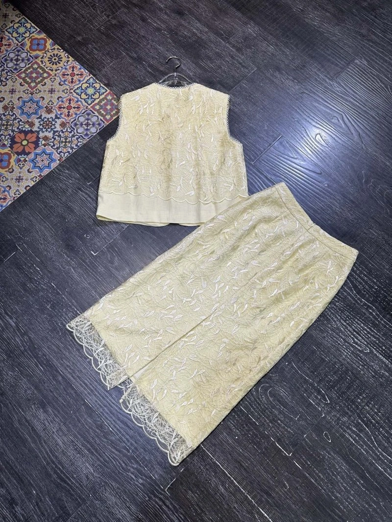 Reasonably priced Chanel Dress Suits