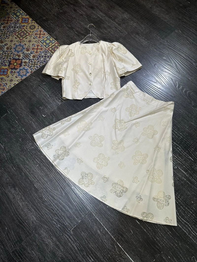 Indistinguishable Chanel Dress Suits