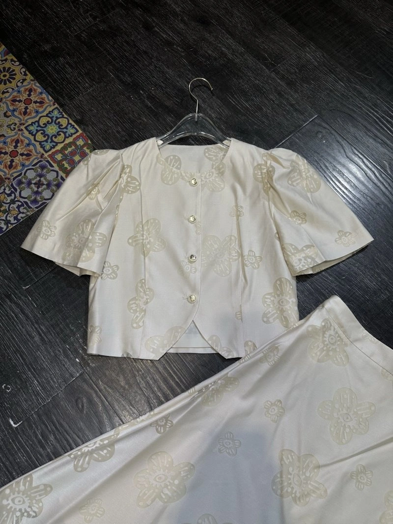 Indistinguishable Chanel Dress Suits