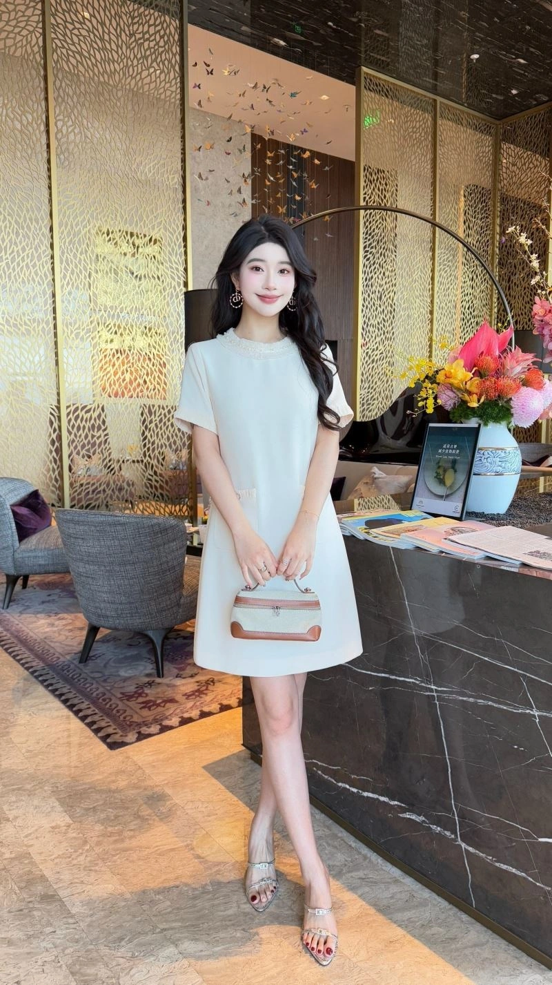 Indistinguishable Chanel Dress