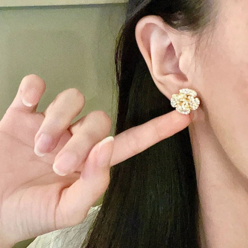 Indistinguishable Chanel Earrings