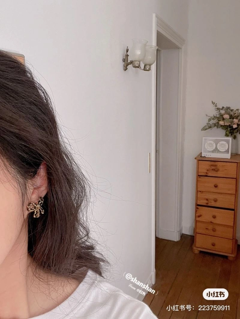 Indistinguishable Chanel Earrings