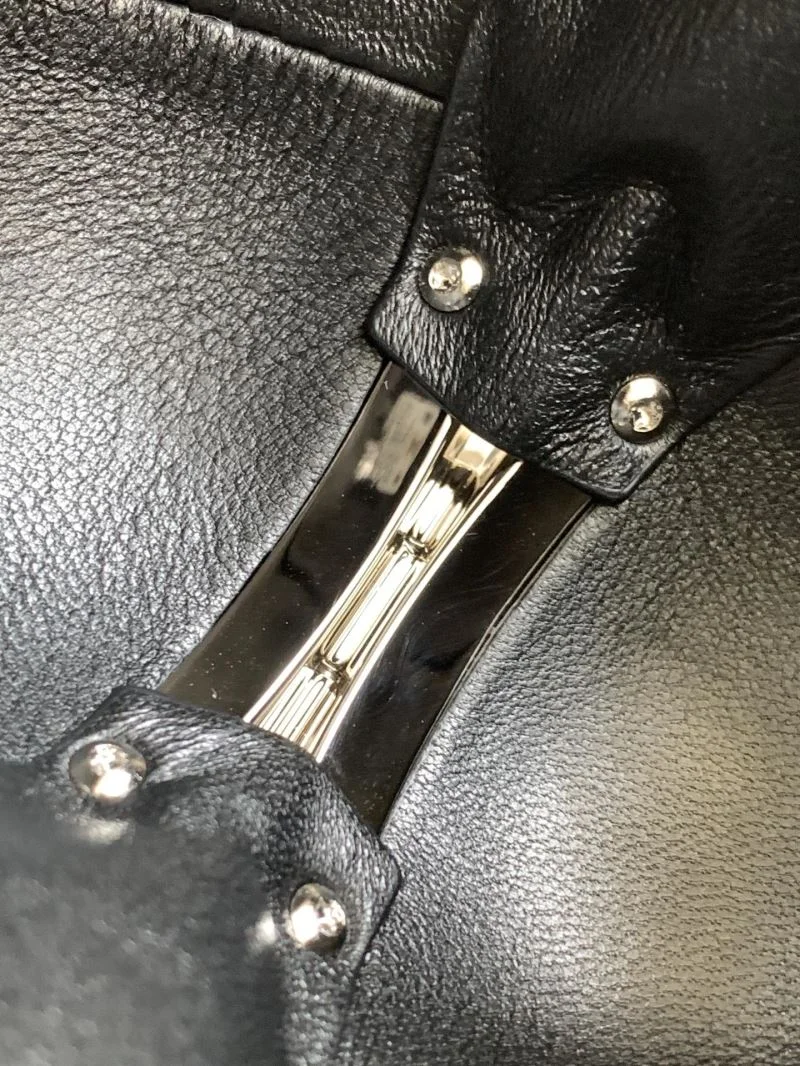 Brand-authenticated Chanel Round Satchel