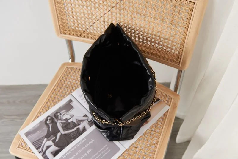 Brand-authenticated Chanel Shopping Bags