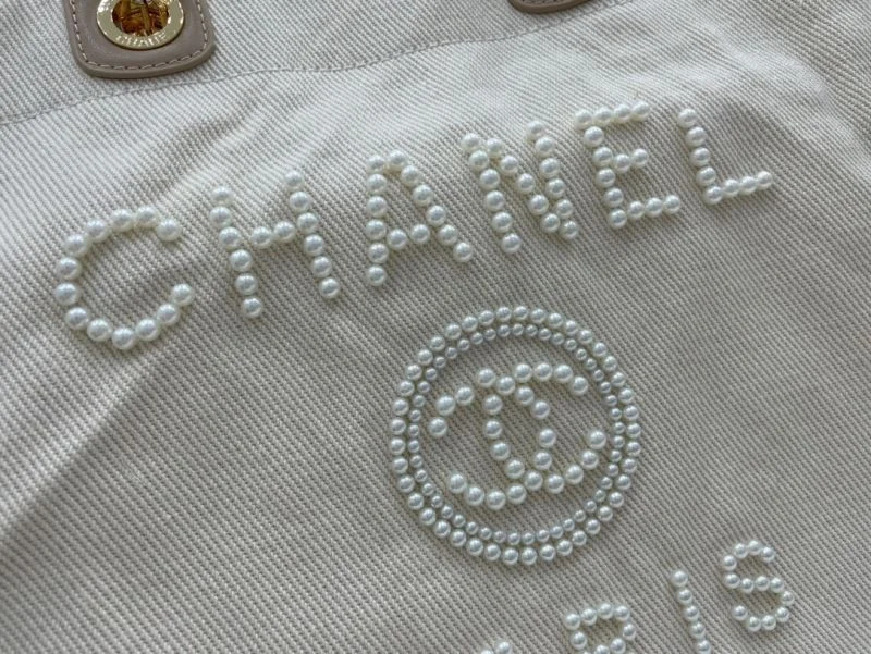Top mirror Chanel Shopping Bags