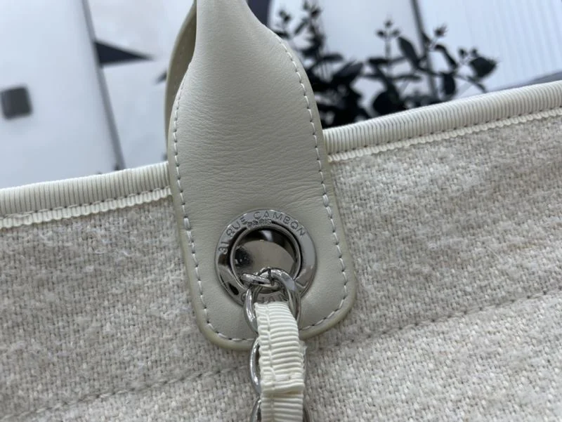 Brand-authenticated Chanel Shopping Bags