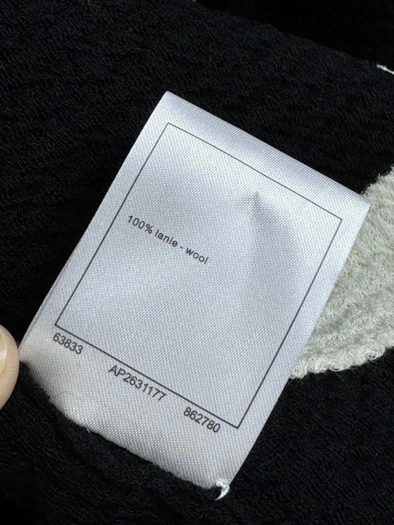 Indistinguishable Chanel Sweaters