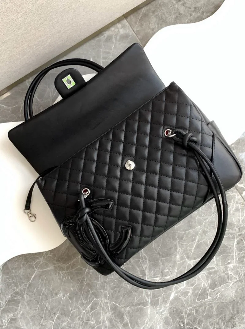 Brand-authenticated Chanel Top Handle Bags