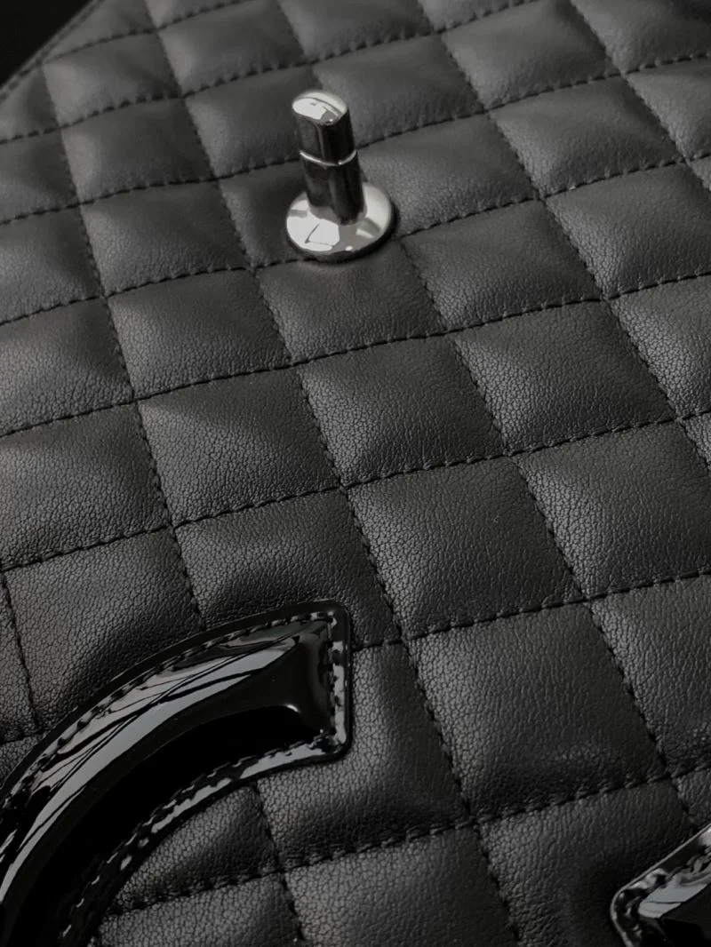 Brand-authenticated Chanel Top Handle Bags