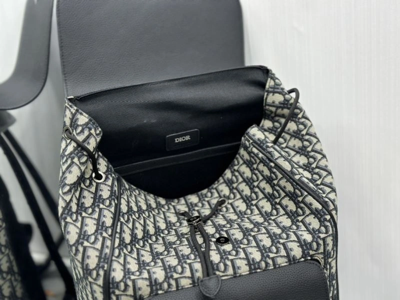 Indistinguishable Christian Dior Backpacks