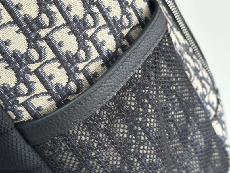 Indistinguishable Christian Dior Backpacks