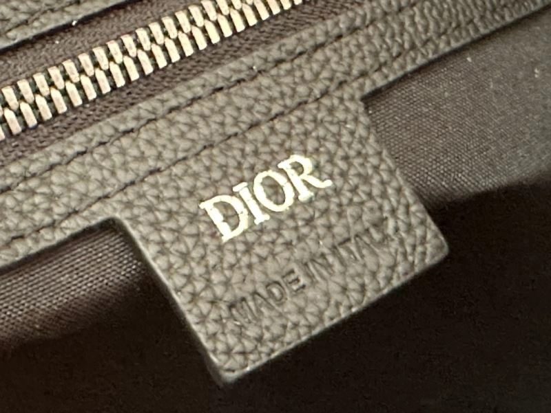Indistinguishable Christian Dior Backpacks