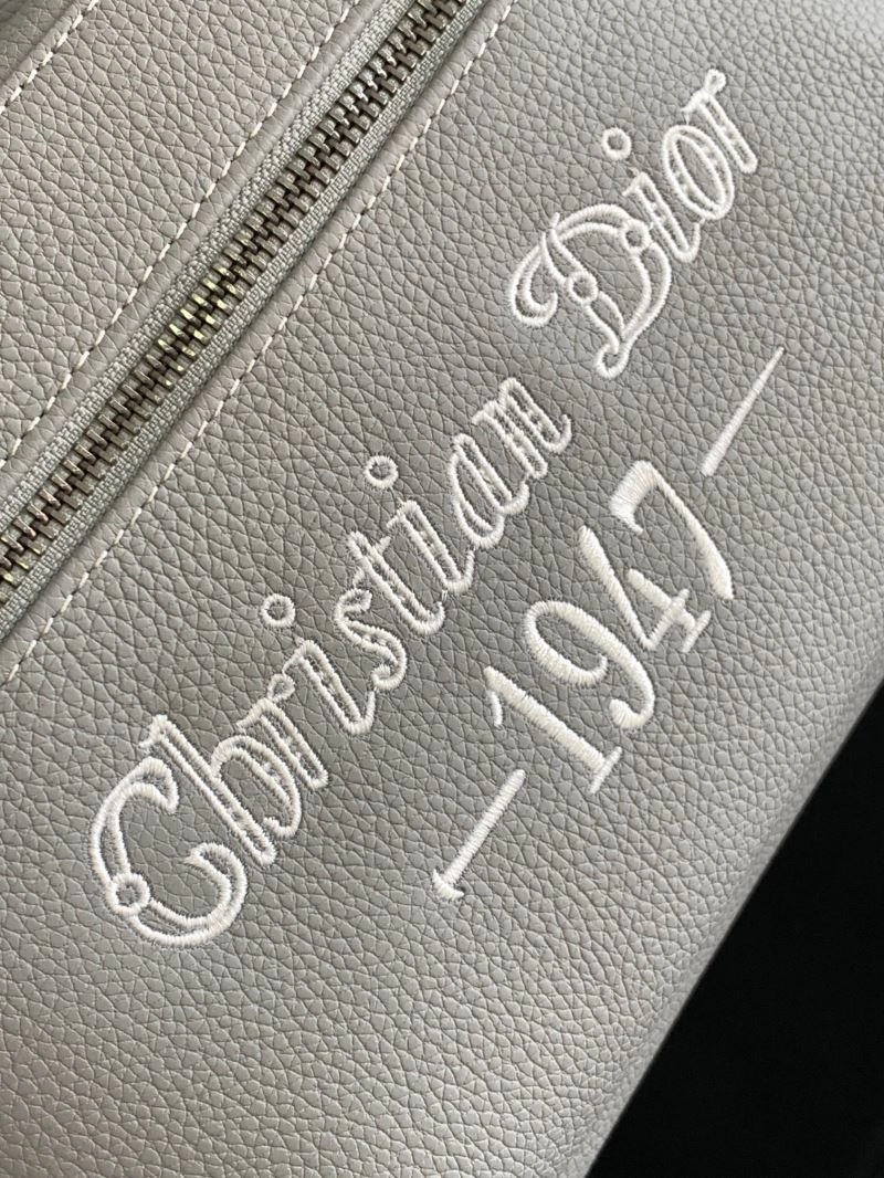 Indistinguishable Christian Dior Backpacks
