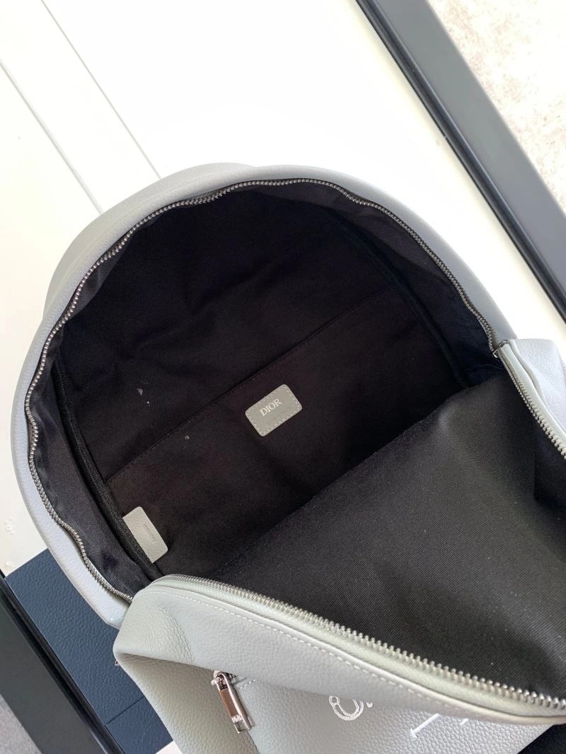 Indistinguishable Christian Dior Backpacks
