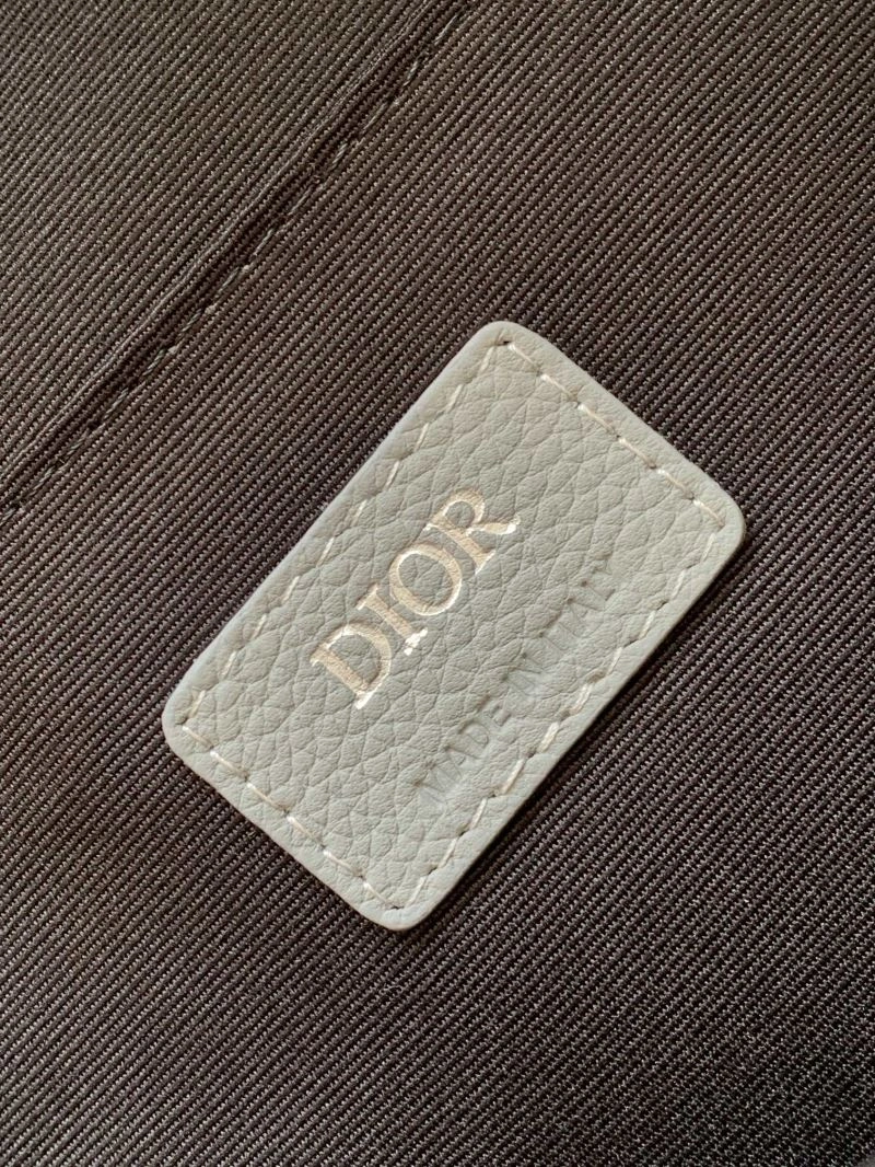 Indistinguishable Christian Dior Backpacks
