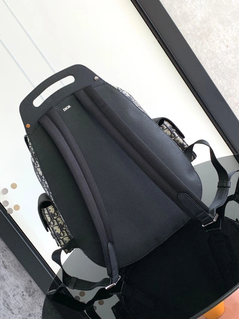 Indistinguishable Christian Dior Backpacks