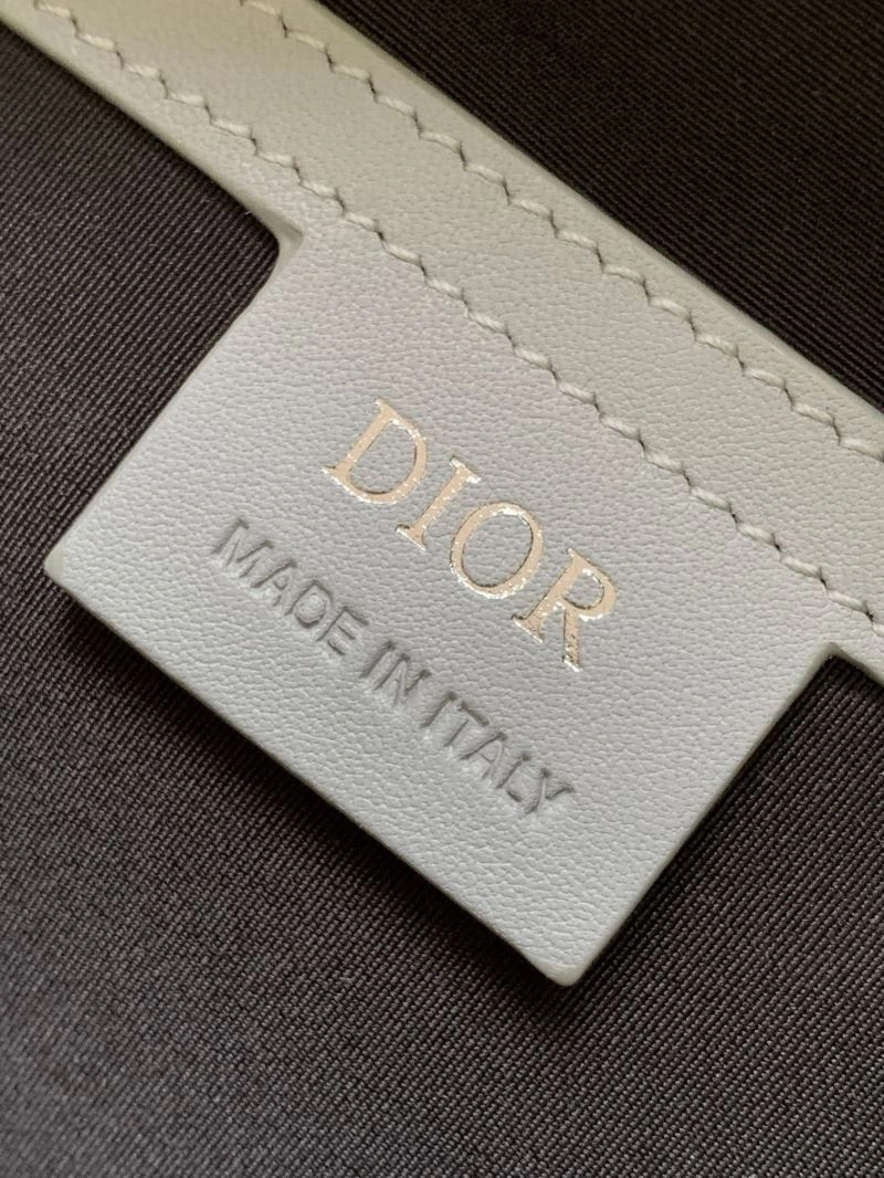 Indistinguishable Christian Dior Backpacks