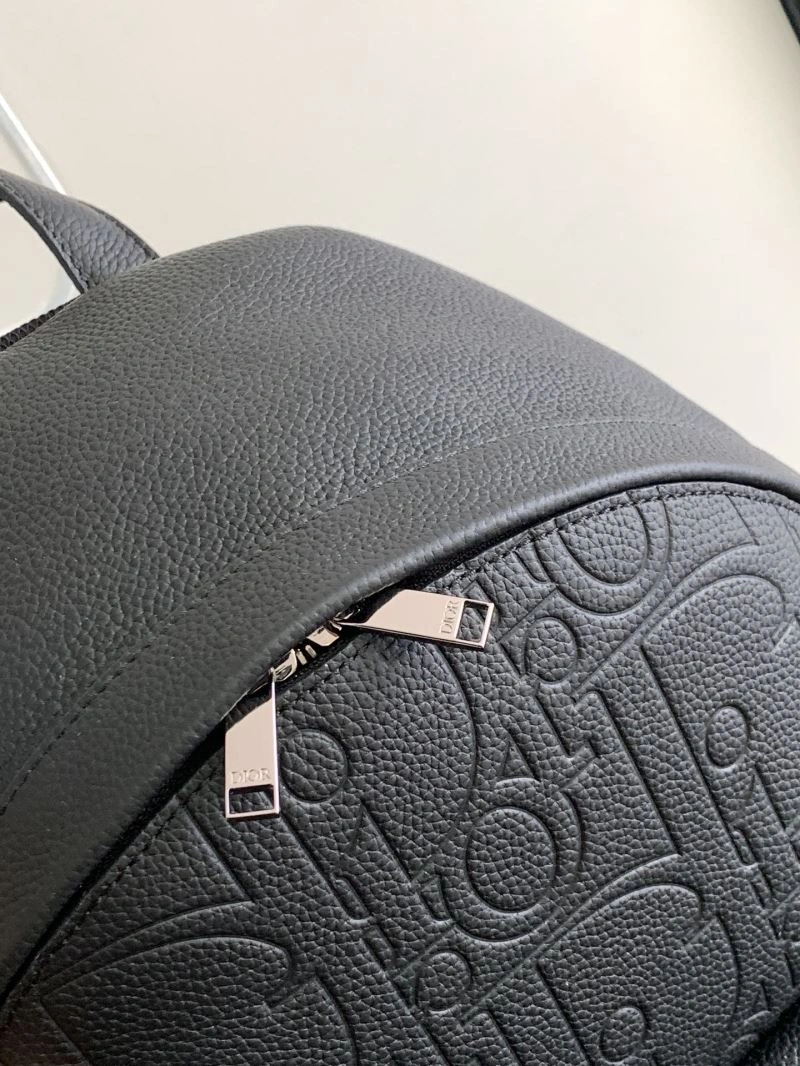 Indistinguishable Christian Dior Backpacks