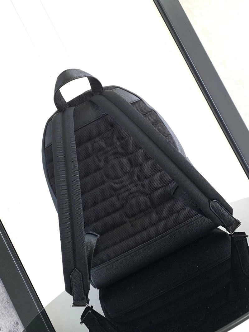 Indistinguishable Christian Dior Backpacks