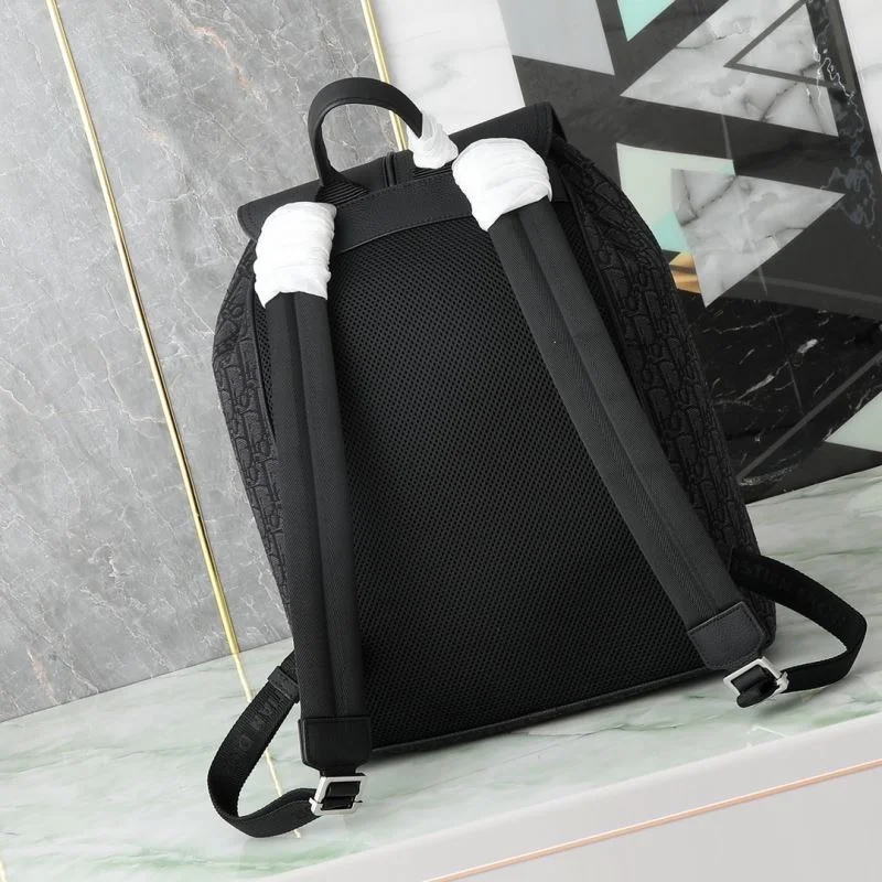 Indistinguishable Christian Dior Backpacks